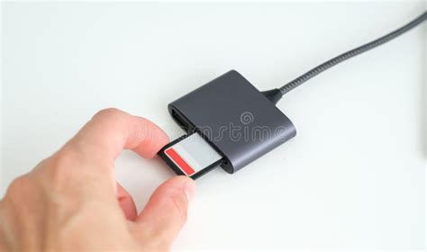 Hand Inserting Memory Card Into Laptop Slot On White Background Stock Photo Image Of Keyboard