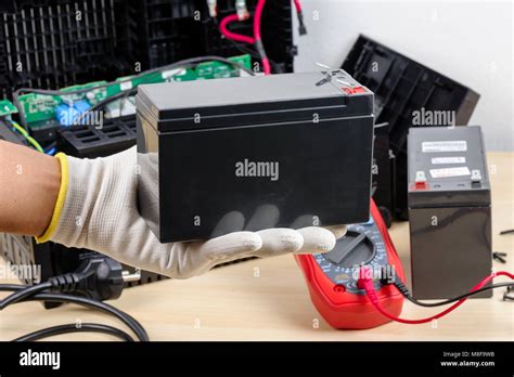 Technician Replacing The UPS Uninterruptible Power Supply Battery Stock Photo Alamy
