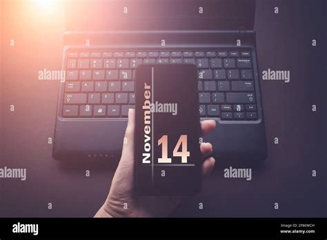 November 14th Day 14 Of Month Calendar Date Hand Holding Mobile