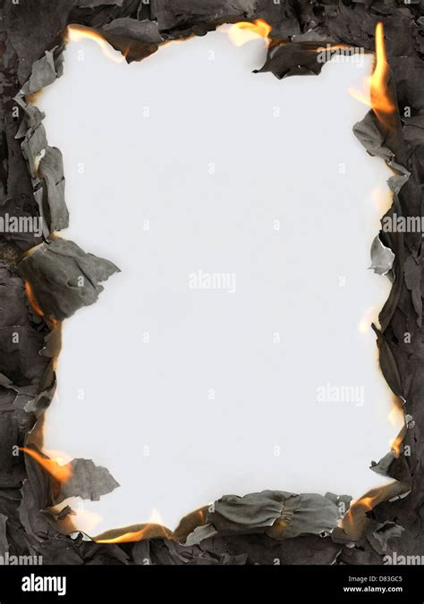 Burning Paper Ashes Revealing Blank White Background Making A Frame