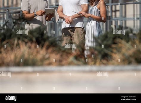 Architects Analyzing Blueprint Discussing Sketches Successful Business People Collaborating