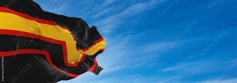 Rubber Fetish Pride Flag Waving In The Wind At Cloudy Sky Freedom And