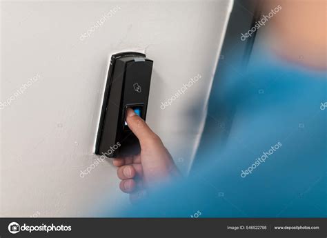 Man Pressing Fingerprint Scanner Alarm System Indoorsfinger Print Scan Unlock Stock Photo