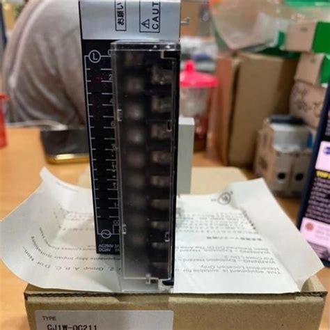 jual plc omron series cj1w oc211 plc output unit omron cj1w 0c211 new