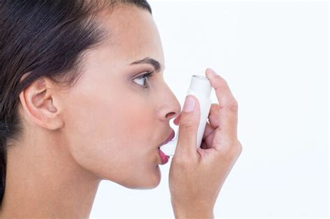 Premium Photo Beautiful Using Her Inhaler