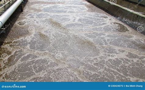 Close Up Of Bubbling Water In A Litthe Cascade In A River In A Forest
