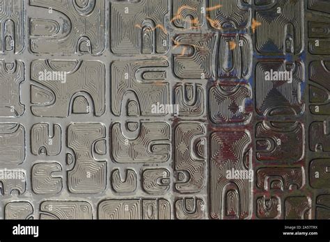 A Close Up Of An Antique Art Deco Modernist Windowpane With Symbolic