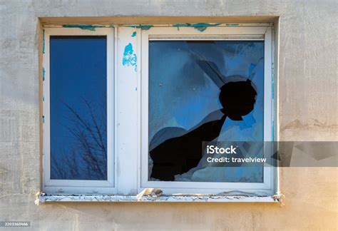 Facade Of Prefabricated Ddr Architecture With Destroyed Window Glass In