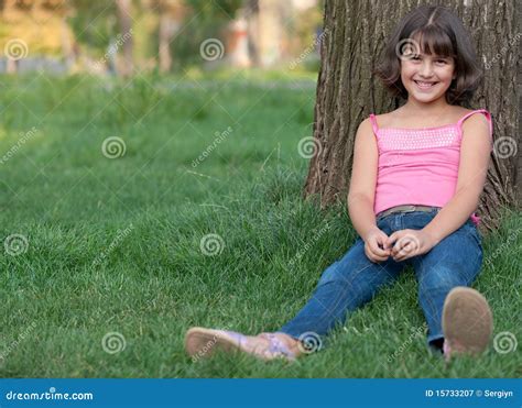 Sitting Girl Against The Tree Stock Image Image Of Bark Jeans 15733207