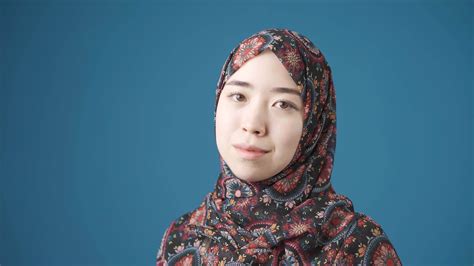 Innocent And Beautiful Muslim Asian Woman In Hijab Smiling Muslim