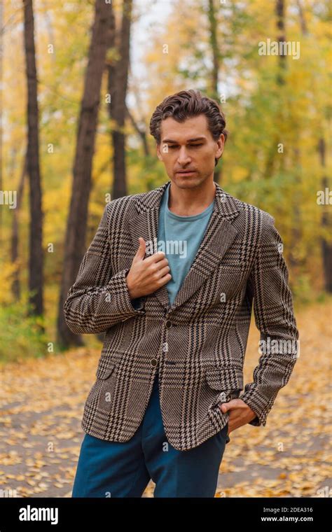 Tall Handsome Man On The Autumn Alley Stock Photo Alamy