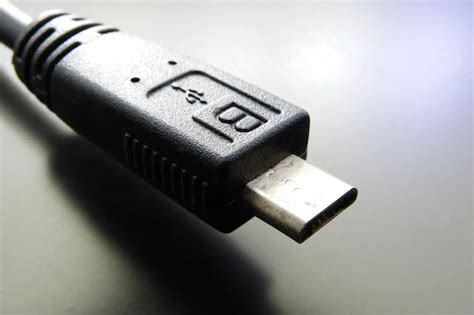Premium Photo Close Up Of Usb Cable Against White Wall