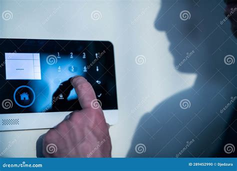 Thief Or Electronic Hacker Is Trying To Break Into An Apartment Secured