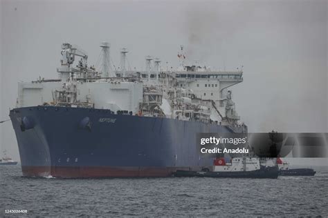An Fsru And Lng Carrier Ship Neptune Being Anchored At The Port Of