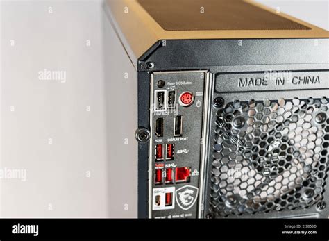 the back of a personal computer system unit black case with