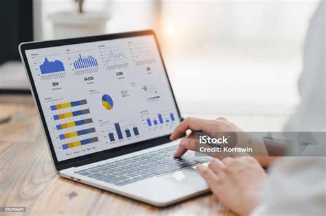 Professional Analyzing Financial Data Graphs Charts On Laptop Display