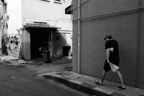 Premium Photo Full Length Of Man Walking On Building
