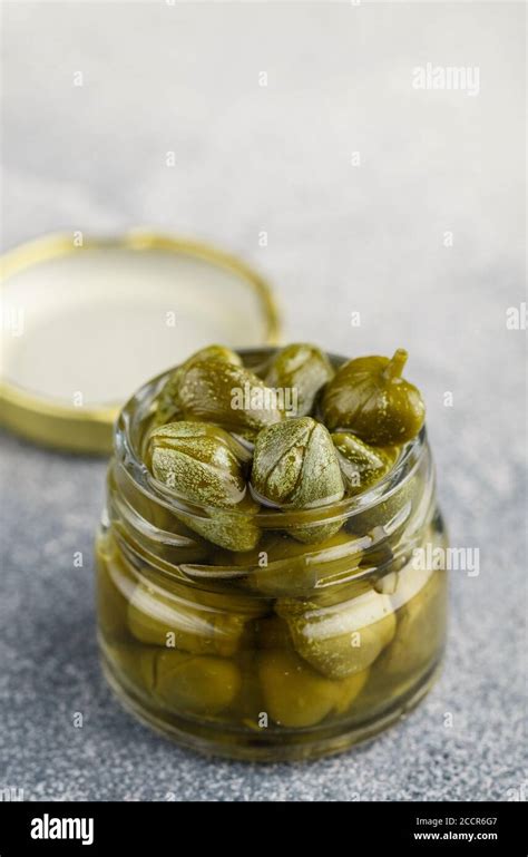 Pickled Or Salted Capers In A Glass Jar Close Up Unopened Flower Buds Delicious Ingredients