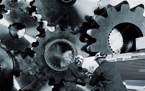 Engineers With Cogs And Gears Stock Image F018 0828 Science Photo Library