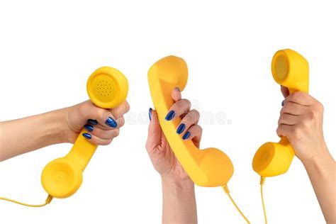 Yellow Handset In Woman Hand Isolated On White Copy Space Stock Image