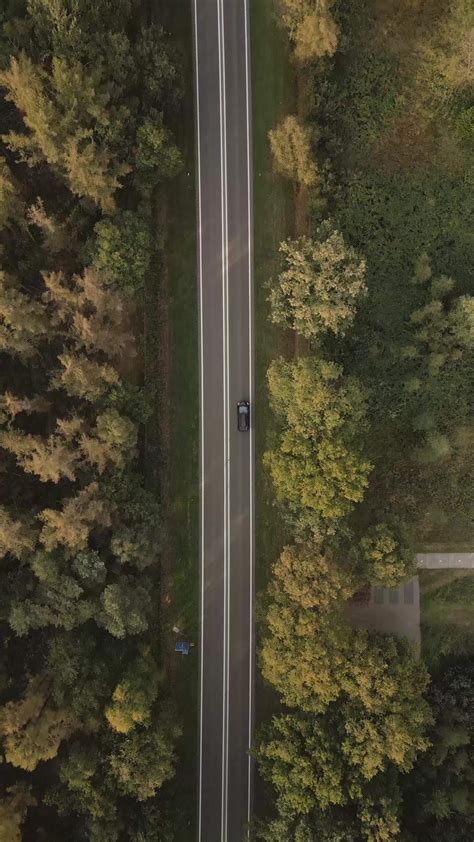 Aerial View Of Parallel Highway Roads In A Grassy Landscape 21244500