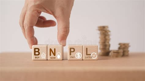 Hand Arranged Wooden Cube Blocks With Bnpl Alphabets Abbreviation