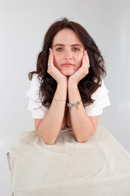 Premium Photo Girl In A White Dress On A White Background