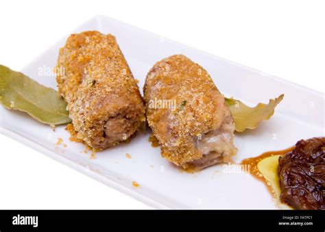 Breaded Meat Rolls On The Tray On White Background Seen Up Close Stock