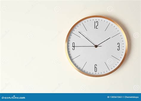 Stylish Analog Clock Hanging On Light Wall Stock Image Image Of
