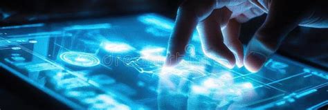 hand interacts with a futuristic interface on a tablet stock