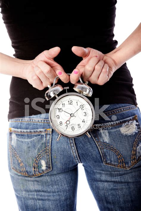 Woman Holding Clock Behind Back Stock Photo Royalty Free Images FreeImages