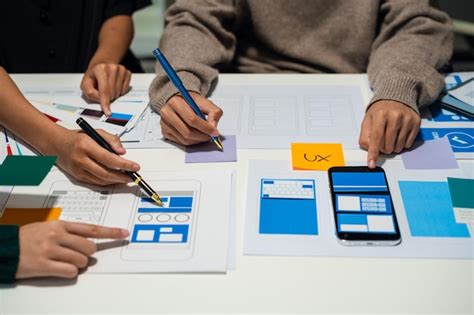 Premium Photo Developer And Designer Brainstorming And Color Code