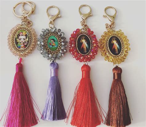 Llaveros Con Imagen Religiosas Y Pompon