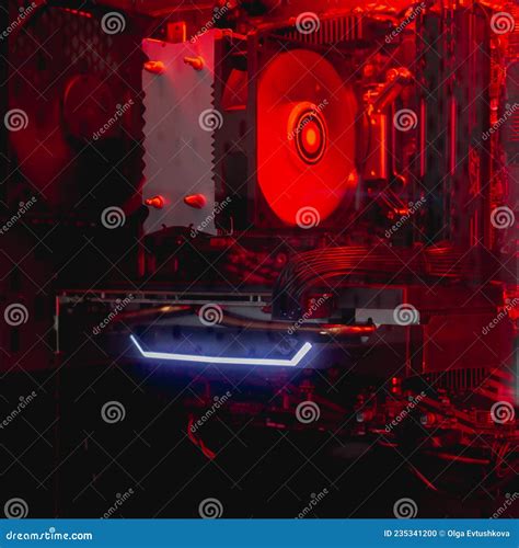 Internal Parts Of The Computer System Unit Cooler Hard Disk Motherboard Video Card In Red