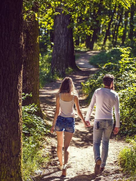 Young Couple Walking In Forest Stock Image Image Of Nature Young