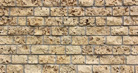 Modern Beige Limestone Cladding Forming A Textured Wall Background