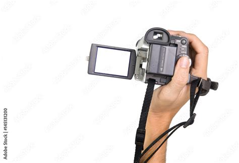Male Hand Holding A Camcorder Camera With A Cutout For Photo Isolated