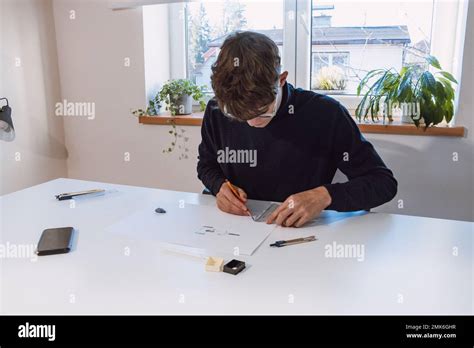 Brown Haired Architect Is Thinking Hard About How To Create New Product