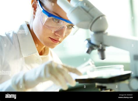 Female Lab Worker Experimenting With Substances To Find New Formula Stock Photo Alamy