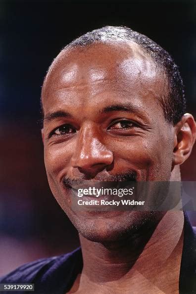 Clyde Drexler Of The Portland Trail Blazers Looks On Against The