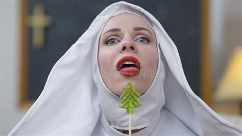 Headshot Of Provocative Seductive Beautiful Woman In Nun Costume