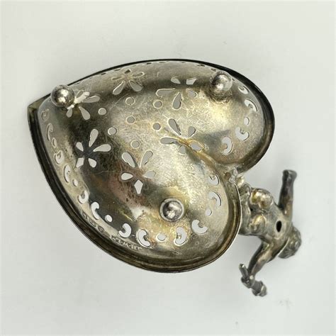 Antique Solid Silver Cherub Figural Strainer Caddy Spoon Henry Williamson 1907 — Wheeler Antiques