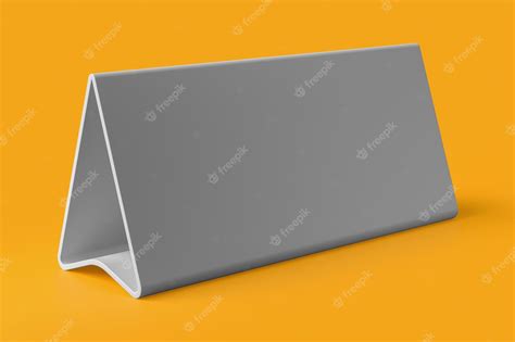 Premium Photo White Triangular Sign Standing On A Shiny Orange Background
