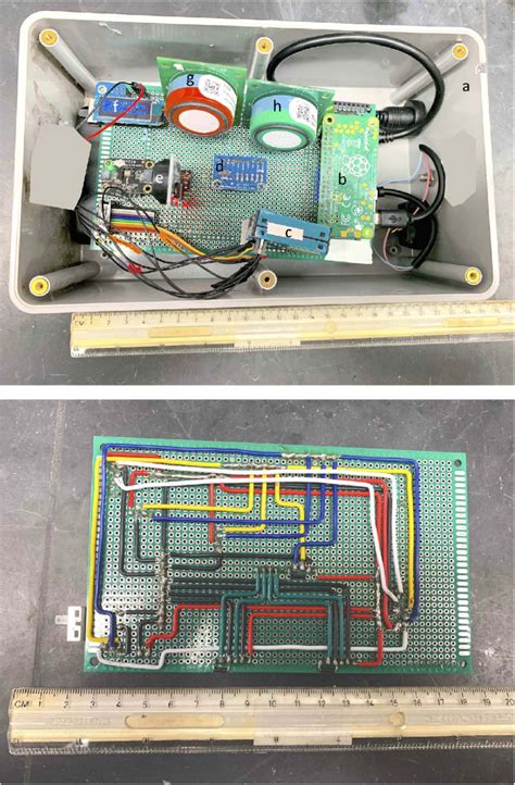 A Photograph Of Sensor Circuit Board With Components A Plastic Box