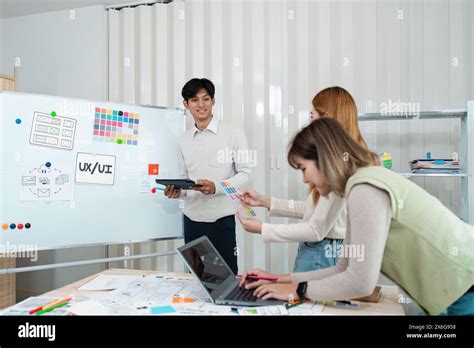 Team Of Ui Ux Web Designer Are Working Together To Develop Mobile