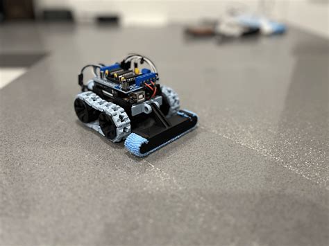 Tiny DIY Roomba Cleans Desks And Countertops Arduino Blog