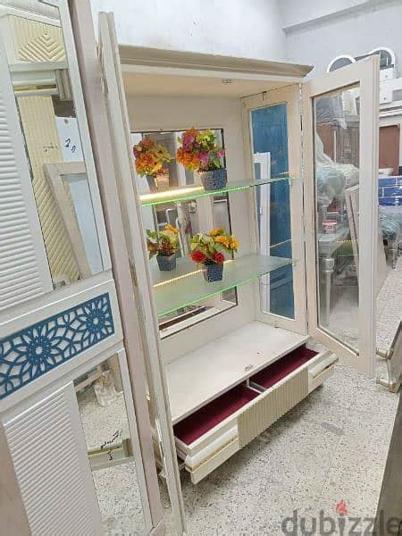 نيش درفتين ضلفتين 2 رف زجاج مقاس130سم خشب كبس محمل Mdf دهان دوكو ميتلك