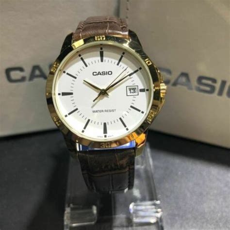 Casio Mtp V004gl 7a Mens Analog Watch Brown Leather Band Gold Date Stamp Watchcharts Marketplace