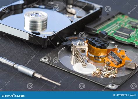 Disassembled Hard Disk Drive Inside Close Up Spindle Actuator Arm Read Write Head Platter