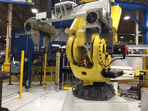machine tending robots remtec robotics and automation